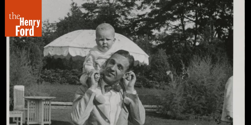Edsel Ford Carrying His Son, Henry Ford II, 1918 - The Henry Ford