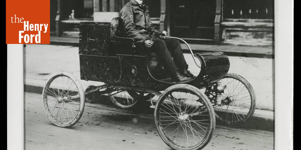 Roy D. Chapin Seated in Curved-Dash Oldsmobile, "First Car to Travel ...