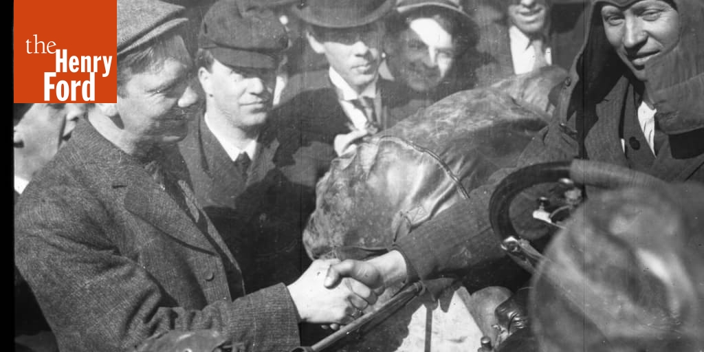 Roberts Shaking Hands with Mathewson, at the Wheel of the Thomas Flyer ...